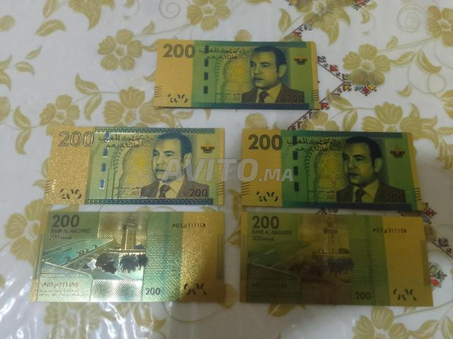 12 BILLETS POLYMER 200 Dh OR | Arts et collections à Rabat | Avito.ma